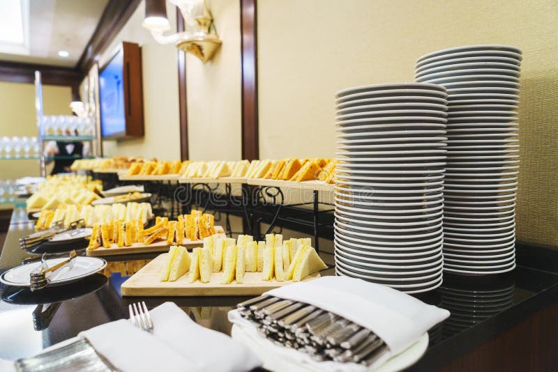 Table with Clean Dishes and Snacks for a Quick Guest Supply. Stock ...