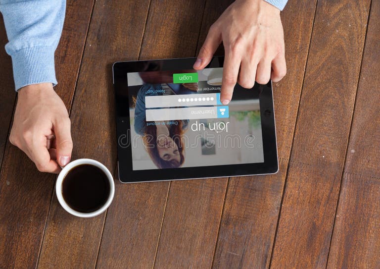 In the Table with the Coffe and the Tablet with Login Screen Stock ...