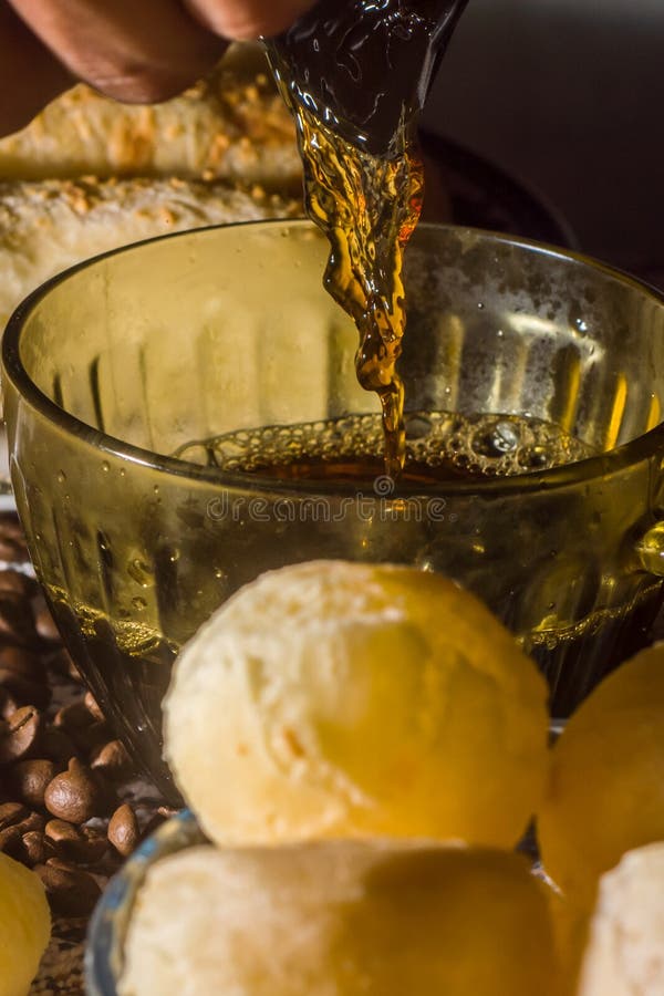 Table with Coffee, Cheese Buns, Coffee Beans on the Table and Coffee ...
