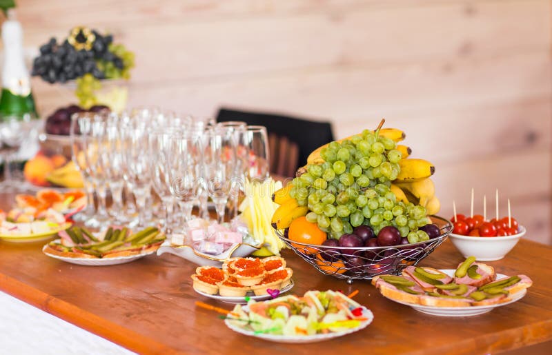 Table with Cold Snacks and Tableware on Stand-up Party Stock Photo ...