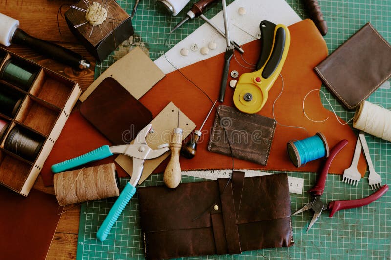 Table Covered with Leather Pieces and Tailor Devices Stock Image ...