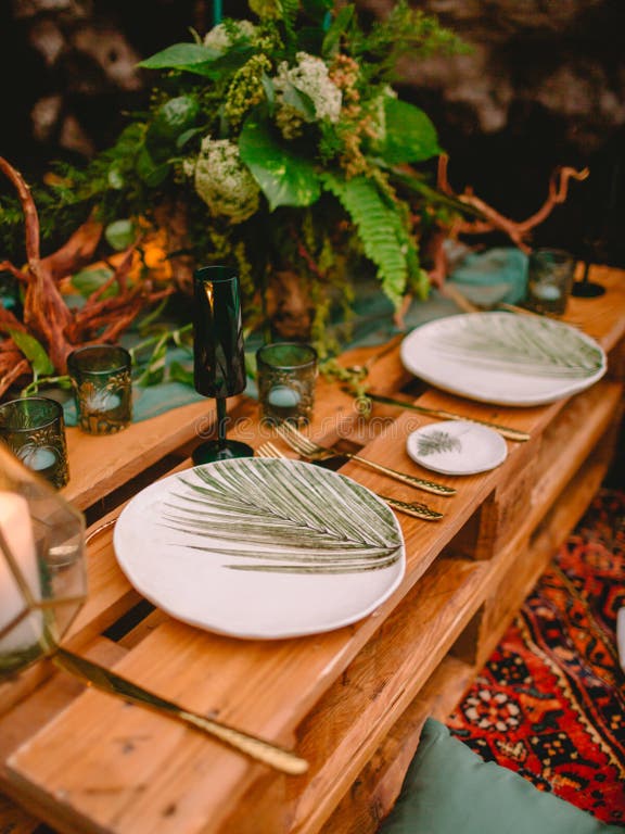 Table with Decor, Plates, Candles and Floristic. Wedding Dinner Stock ...