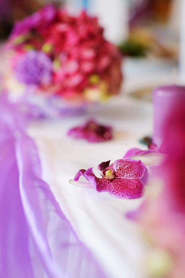 A Table Decorated with a Purple Flowers Stock Image - Image of ...