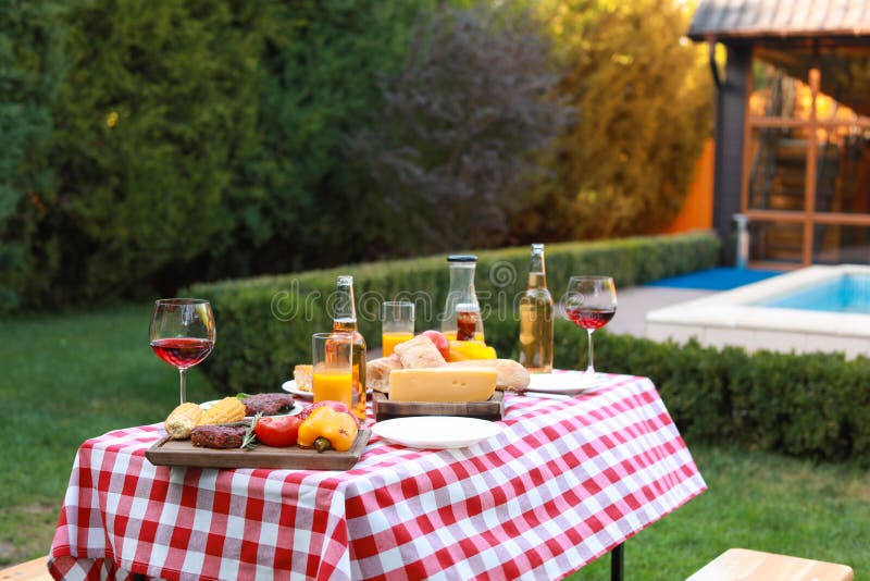 Table with Delicious Food and Drinks. Barbecue Party Stock Image ...