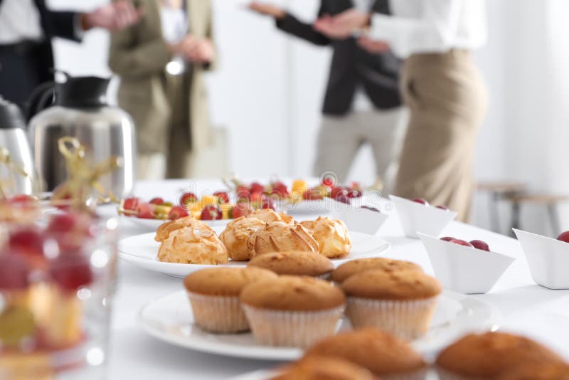 Table with Different Delicious Snacks Indoors. Coffee Break Stock Photo ...