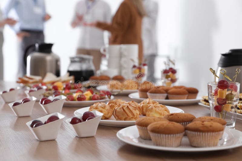 Table with Different Delicious Snacks Indoors. Coffee Break Stock Photo ...