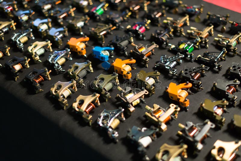 Table with Different Tattoo Machines Assortment Stock Image - Image of ...