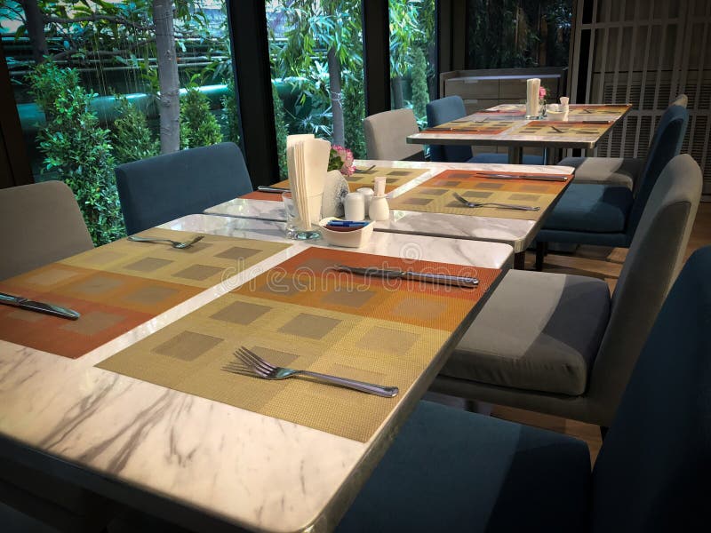 Table dining set in hotel stock image. Image of decor - 109793215