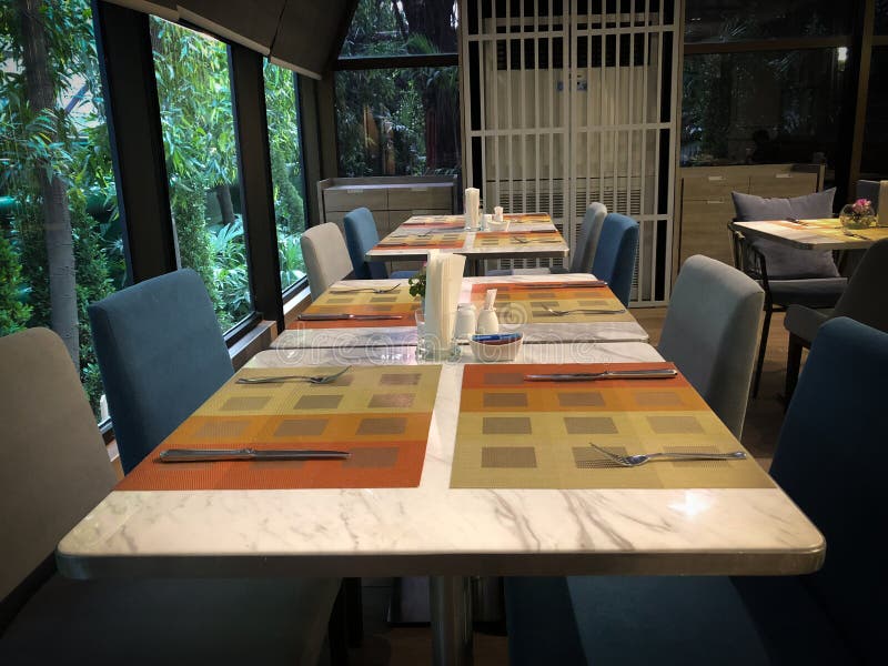 Table dining set in hotel stock image. Image of cafe - 109670569
