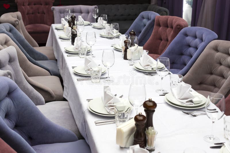 Table with Dishes and Chairs Near the Table Stock Image - Image of ...