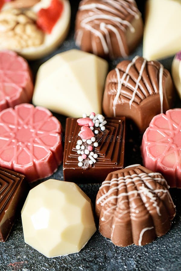 Assorted Types of Chocolates Spread on a Table Stock Photo - Image of ...