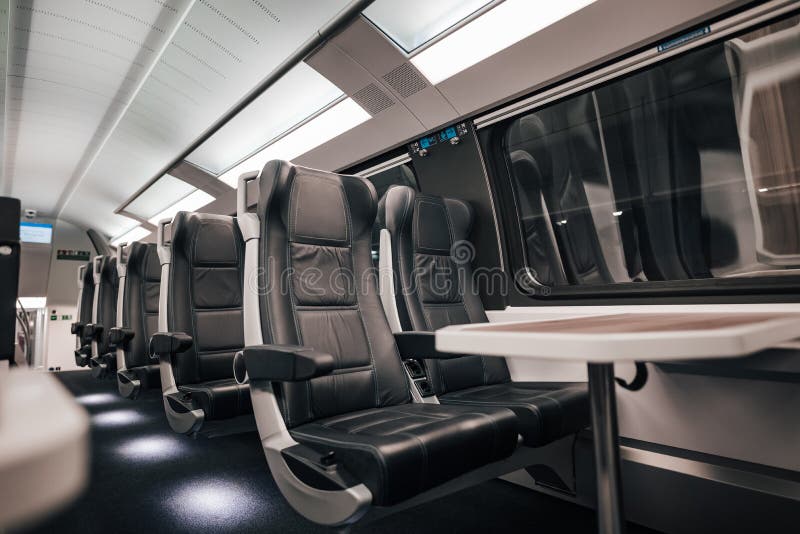 Table and Empty Comfortable Seats in Modern Passenger Train Stock Photo ...