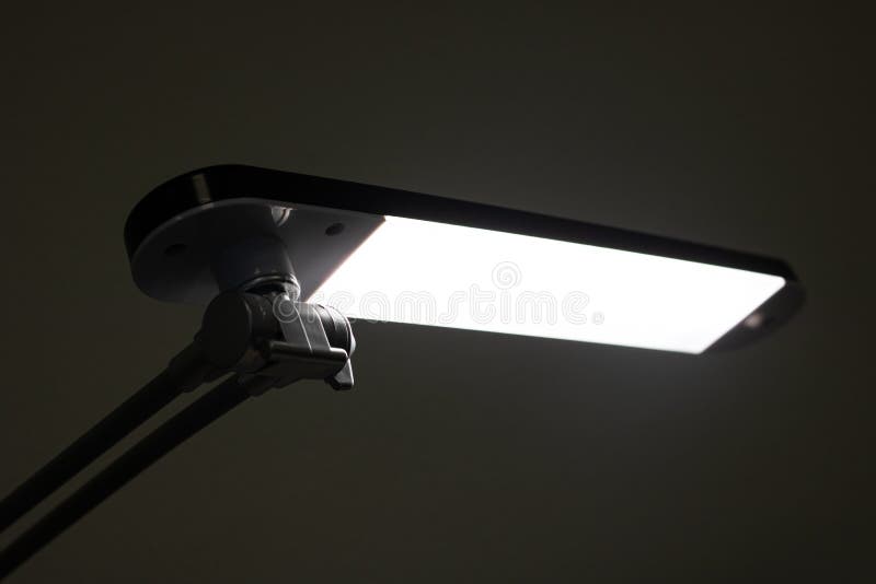 Table Fluorescent Lamp Shines in the Dark Stock Image - Image of ...