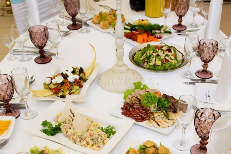 A Table with Food Dishes in the Restaurant. Stock Photo - Image of ...