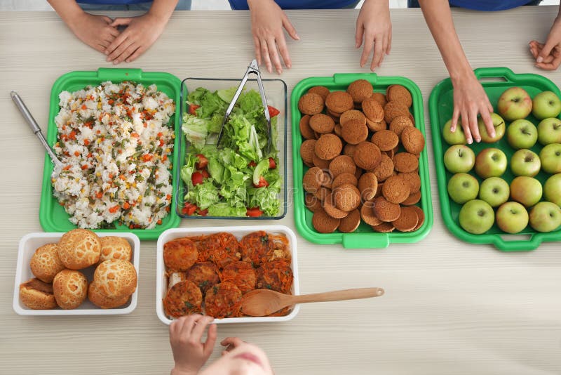 Table with Food by Volunteers for Poor People, Top View Stock Photo ...