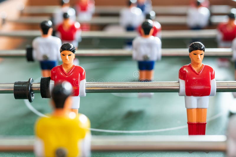 Table Football Soccer Game - Close Up To the Players Wearing Red Shirt ...
