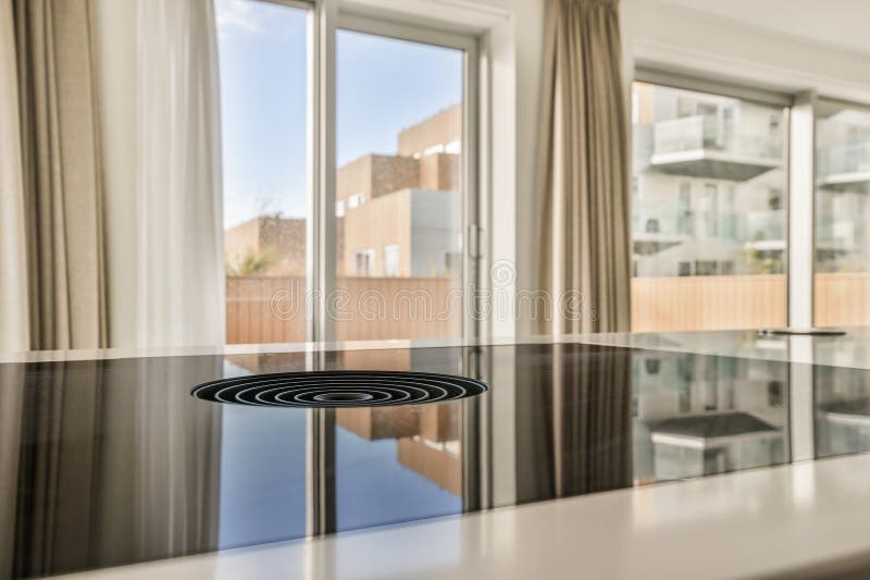 A Table in Front of a Window with a View Stock Photo - Image of wood ...