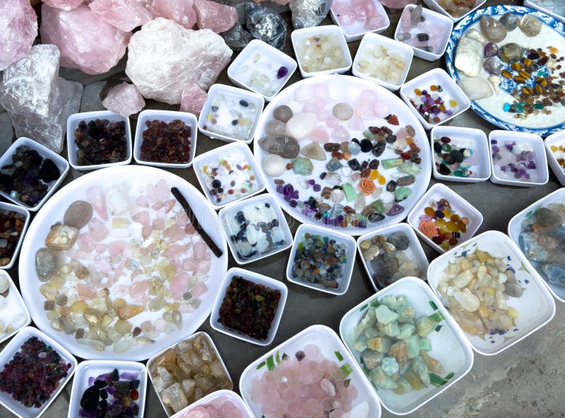 A Table Full of Different Colored Rocks and Crystals Stock Image ...