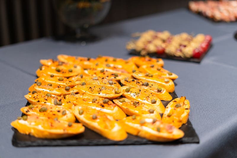 Table Full of Snacks. Tasty Appetizers Served for People Stock Photo ...