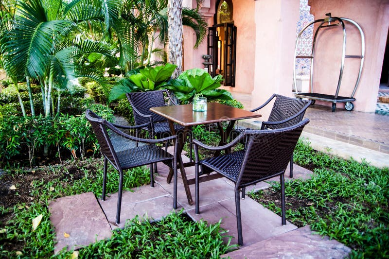Table in garden stock photo. Image of country, patio - 33889082