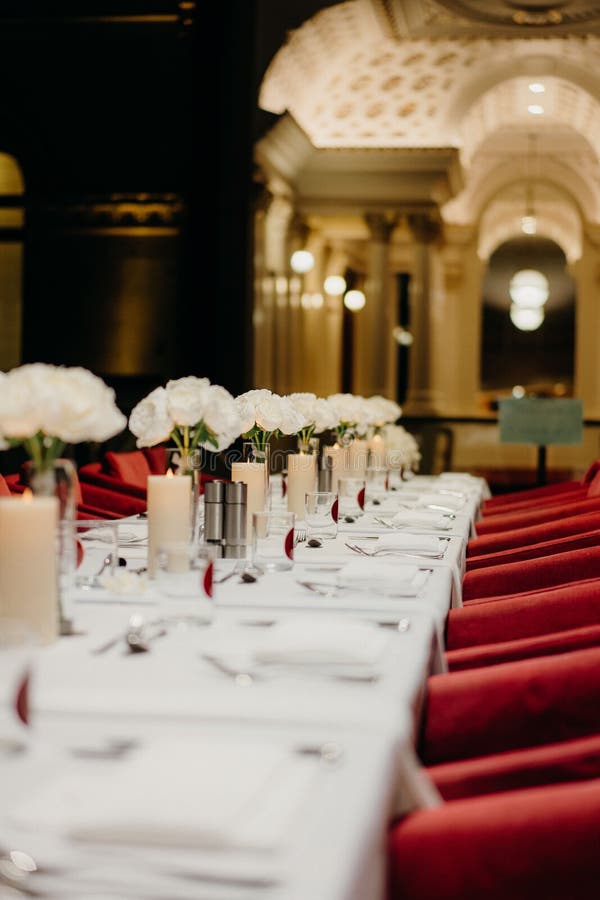 Table in a Hall with Red Chairs Ready for a Wedding Event Stock Photo ...