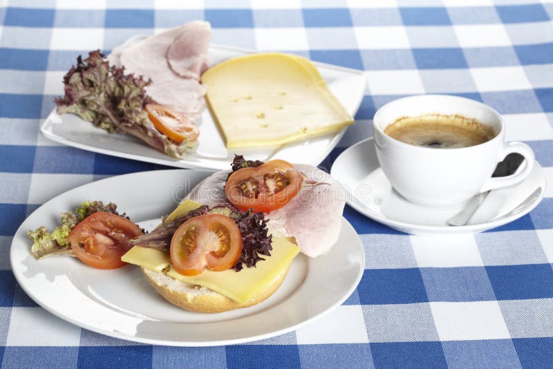 Table with Ham and Cheese Rolls and a Cup of Coffee Stock Photo - Image ...