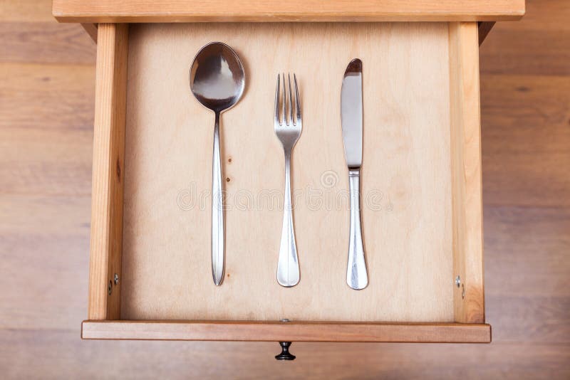 Table Knife, Fork, Spoon in Open Drawer Stock Photo - Image of drawer ...