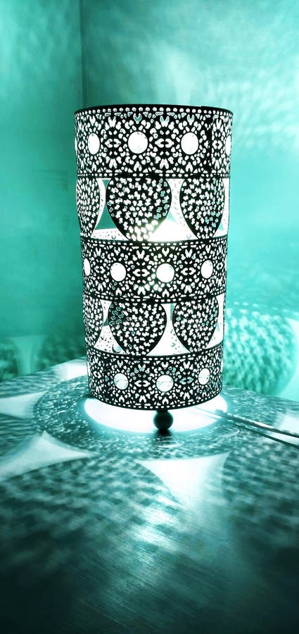 Table Lamp with Cut Outs Creating a Pattern. Stock Image - Image of ...