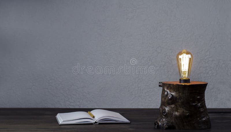 Table Lamp. Open Book. Light from the Lamp. Open Bible. Stock Image ...