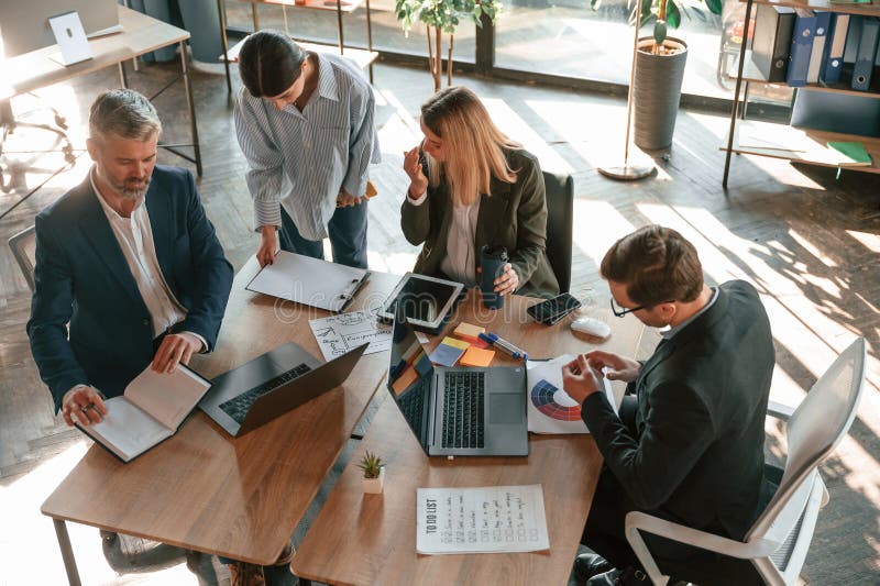 By the Table with Laptops. Top View Stock Image - Image of company ...