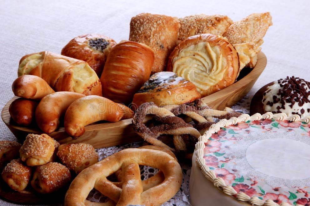 Table with Loads of Cakes, Cupcakes and Pies. Cake Selection on White ...