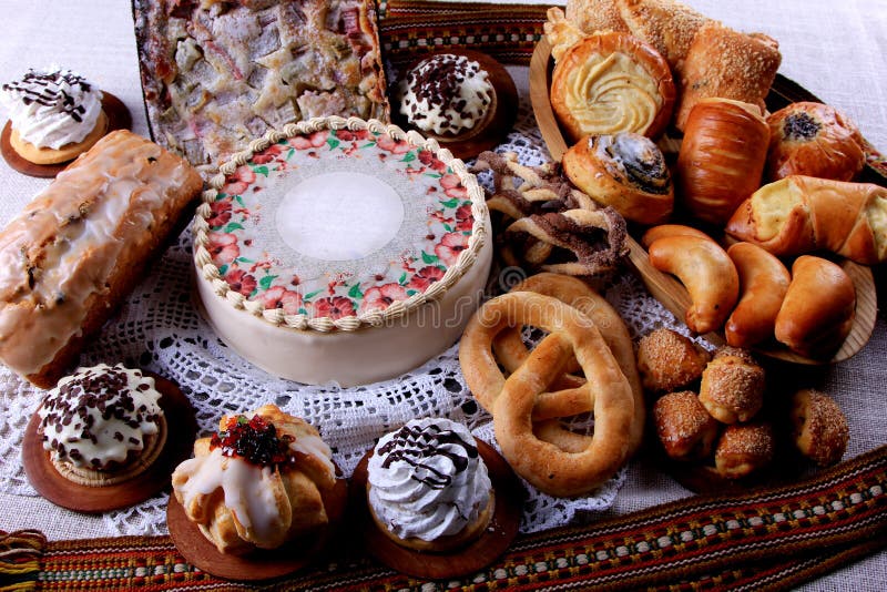 Table with Loads of Cakes, Cupcakes and Pies. Cake Selection on White ...