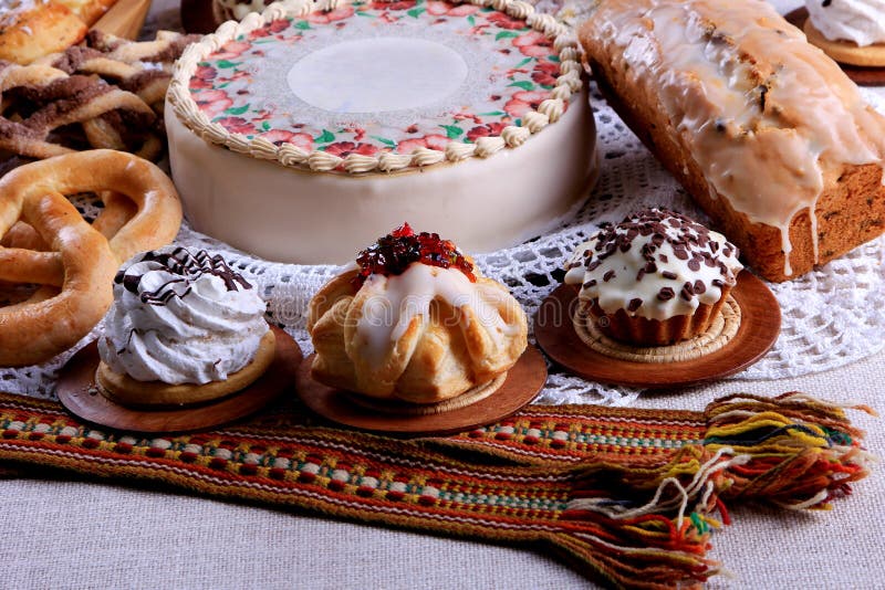 Table with Loads of Cakes, Cupcakes and Pies. Cake Selection on White ...