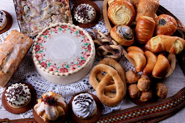 Table with Loads of Cakes, Cupcakes and Pies. Cake Selection on White ...