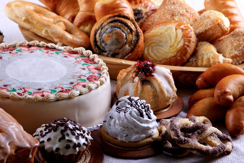 Table with Loads of Cakes, Cupcakes and Pies. Cake Selection on White ...