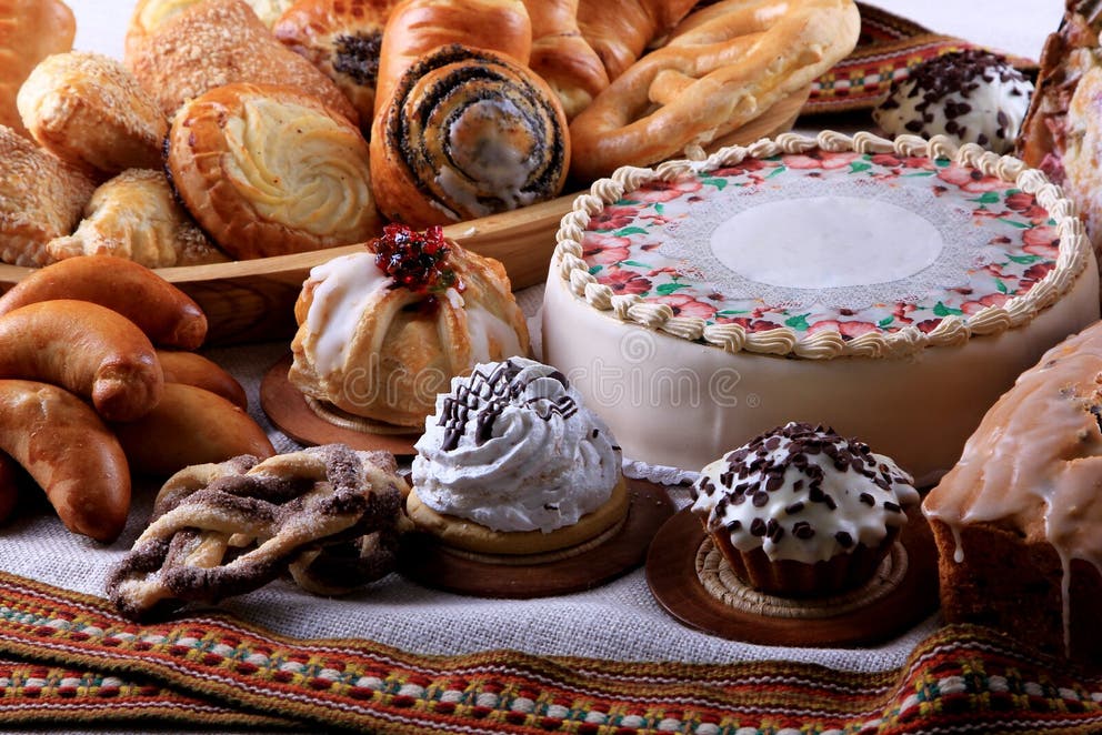 Table with Loads of Cakes, Cupcakes and Pies. Cake Selection on White ...