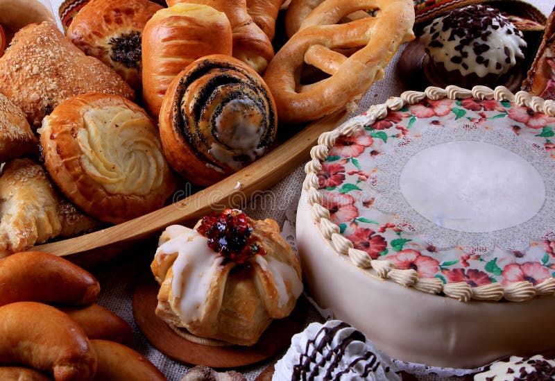 Table with Loads of Cakes, Cupcakes and Pies. Cake Selection on White ...