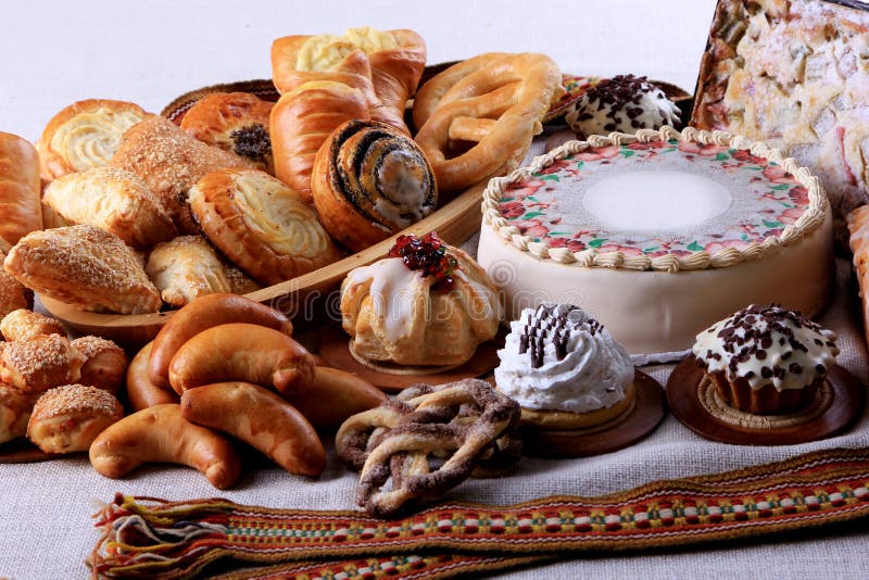 Table with Loads of Cakes, Cupcakes and Pies. Cake Selection on White ...