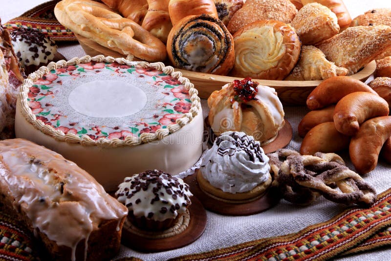 Table with Loads of Cakes, Cupcakes and Pies. Cake Selection on White ...
