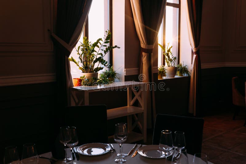 Table in a Luxurious Restaurant in Front of the Window Stock Image ...