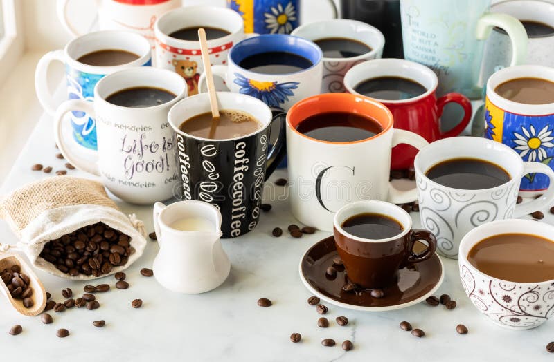 A Table of Many Cups of Coffee with Selective Focus on the Word Coffee ...