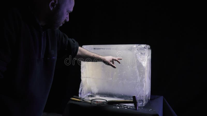Man is Pointing at the Spots on an Ice Block before Making Ice ...