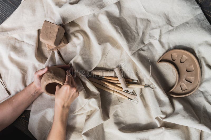 Table with Materials and Tools for Pottery Making Craftsperson ...