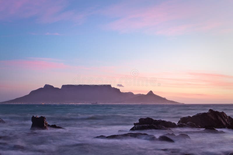 Table mountain sunset stock image. Image of beach, clouds - 6333811