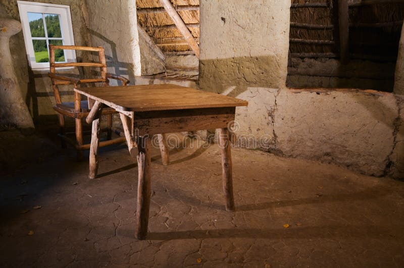Table in the Mud Hut_horizontal Stock Photo - Image of ailing, house ...