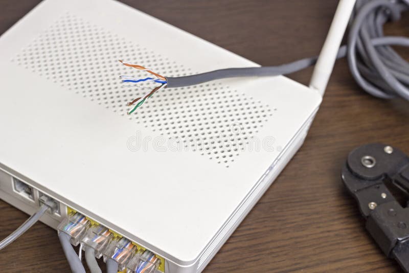 On the Table, the Network Cable and Modem, Router Stock Photo - Image ...