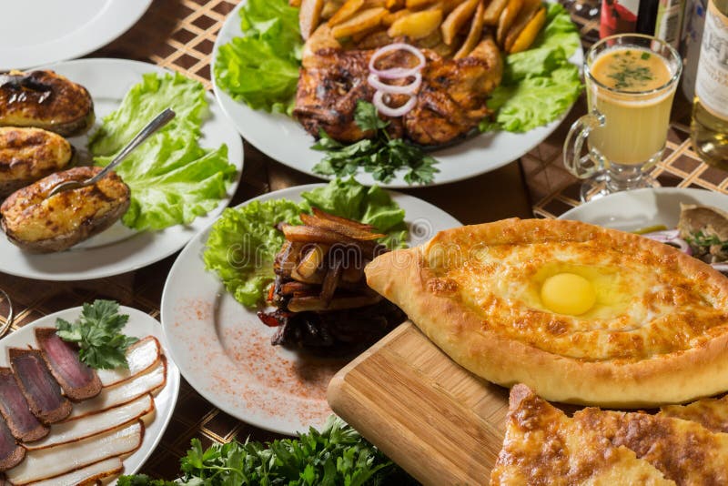 Table with Normal Food, Steaks and Potatoes. Stock Photo - Image of ...