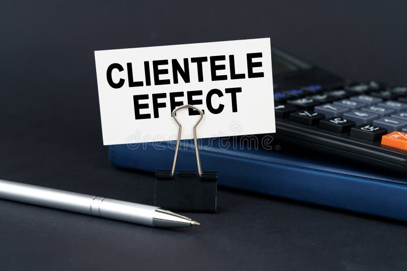 On the Table is a Notebook, a Calculator, a Pen and a Business Card ...