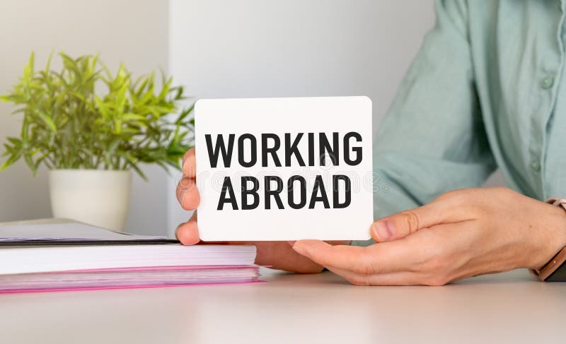 On the Table, Notebook Paper in Hands Female with the Inscription ...