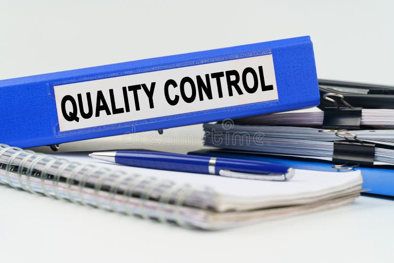 On the Table are a Notebook, a Pen, Documents and a Folder with the ...